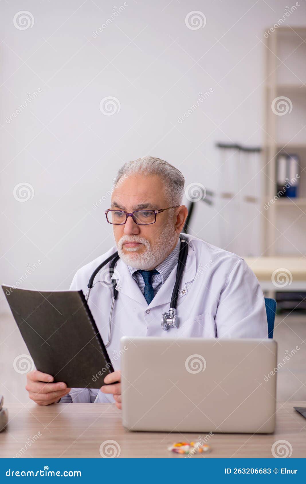 Old Male Doctor Working in the Clinic Stock Image - Image of specialist ...