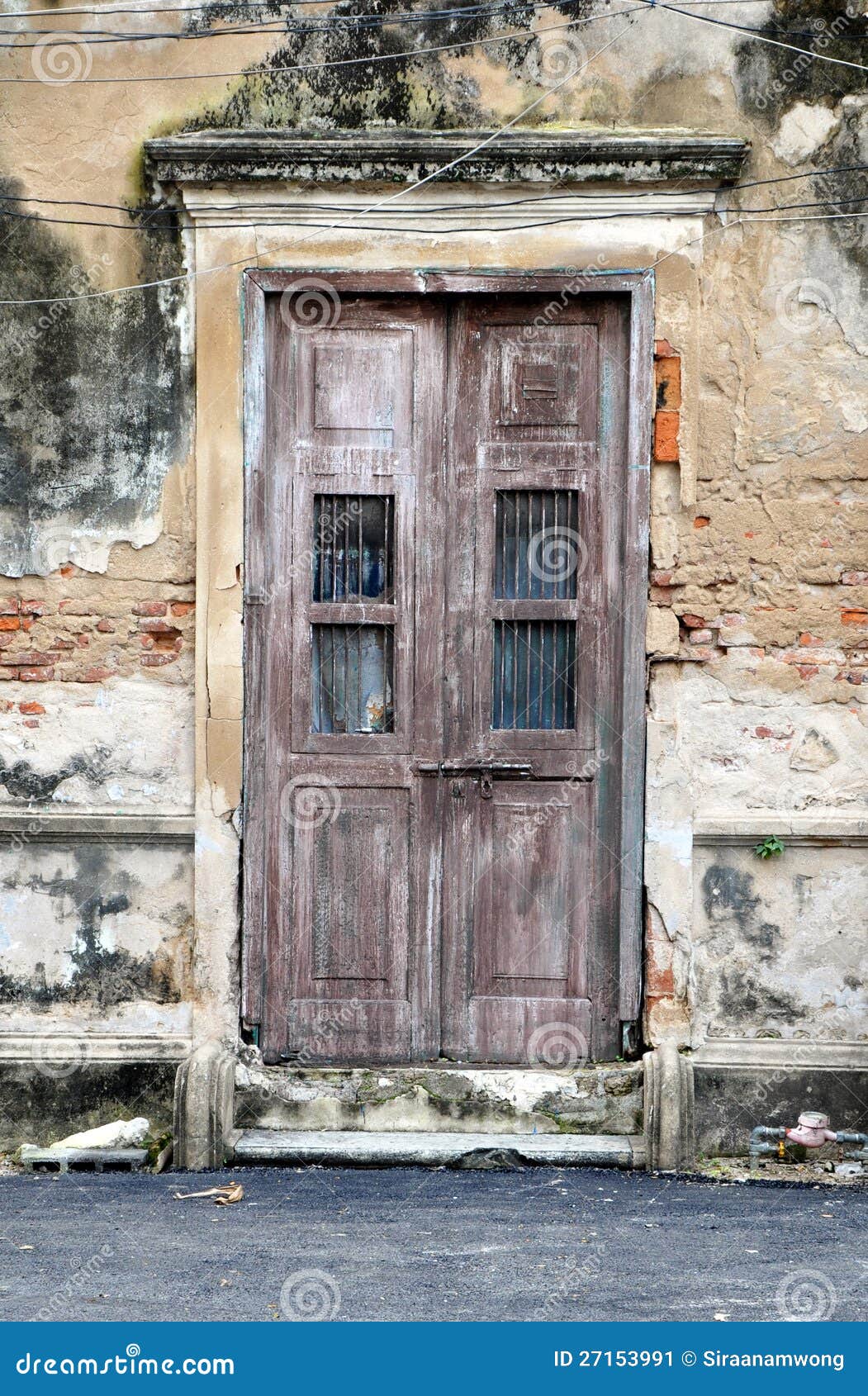 Old door of brick building stock image. Image of handle - 27153991
