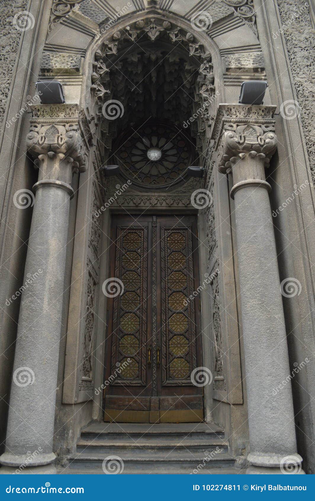 Old door with columns stock image. Image of archway - 102274811