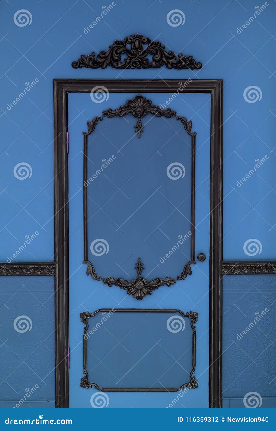 Old Dramatic Blue Doors on the Background of the Wall. Stock Photo ...