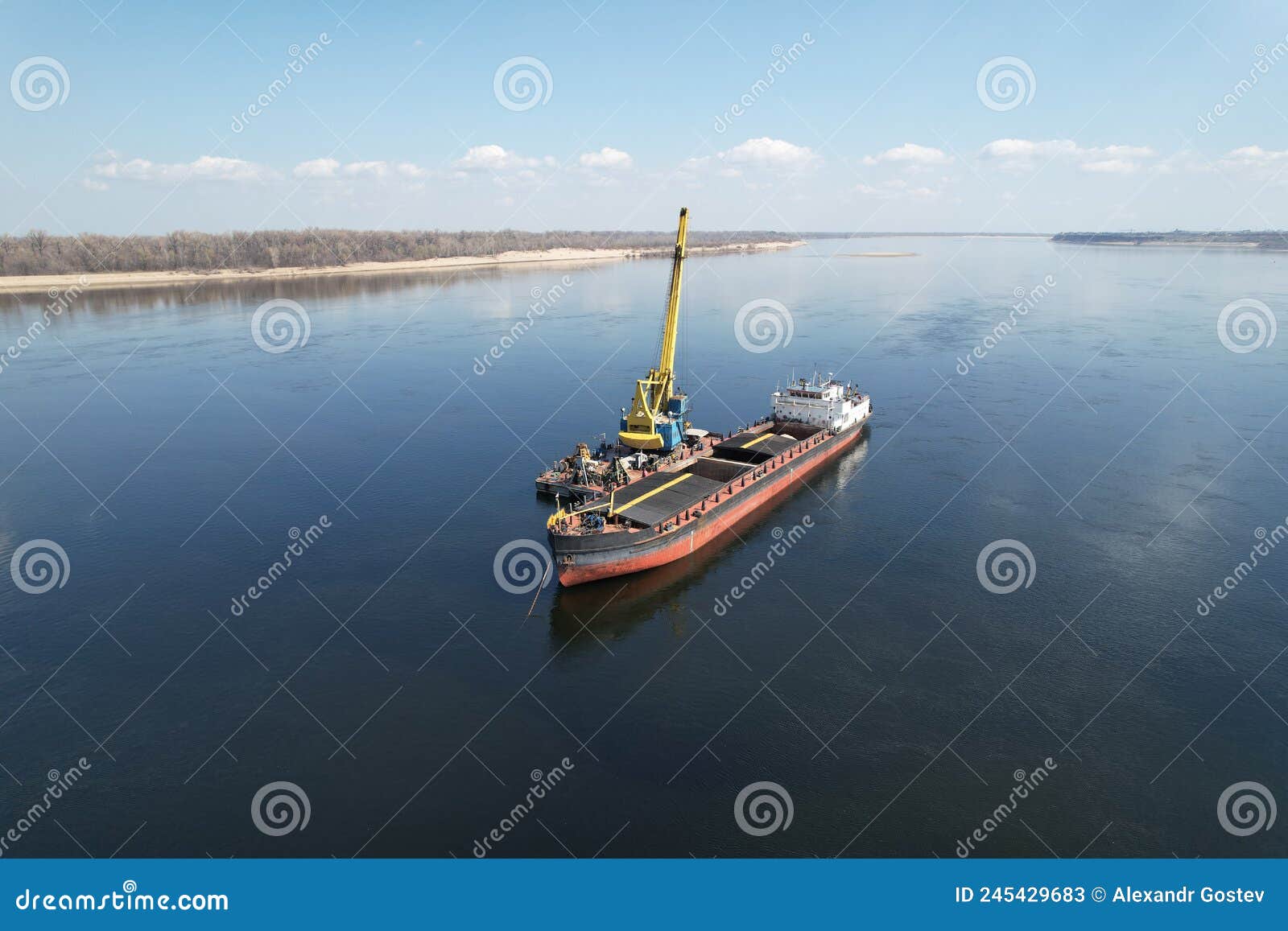 An Old Dry-cargo Ship is Anchored Under Sand Loading on the Volga Stock ...
