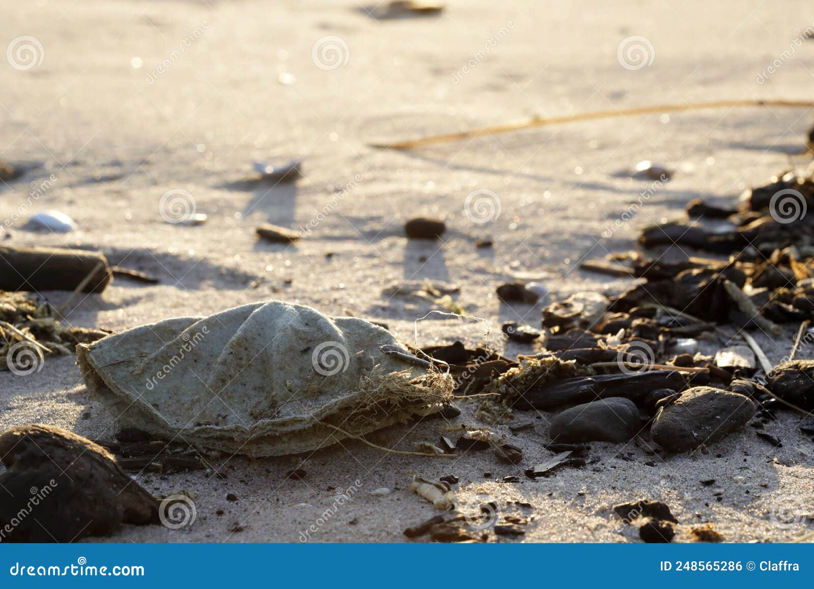 Old Dust Mask Washed Ashore on a Beach Stock Photo - Image of ...