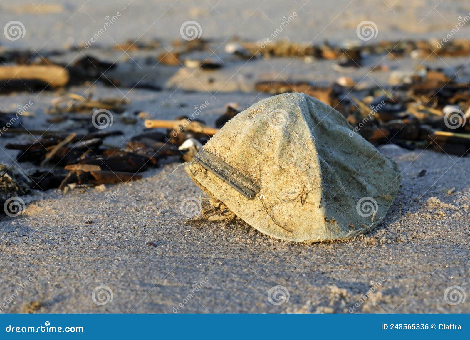 Old Dust Mask Washed Ashore on a Beach Stock Photo - Image of ...