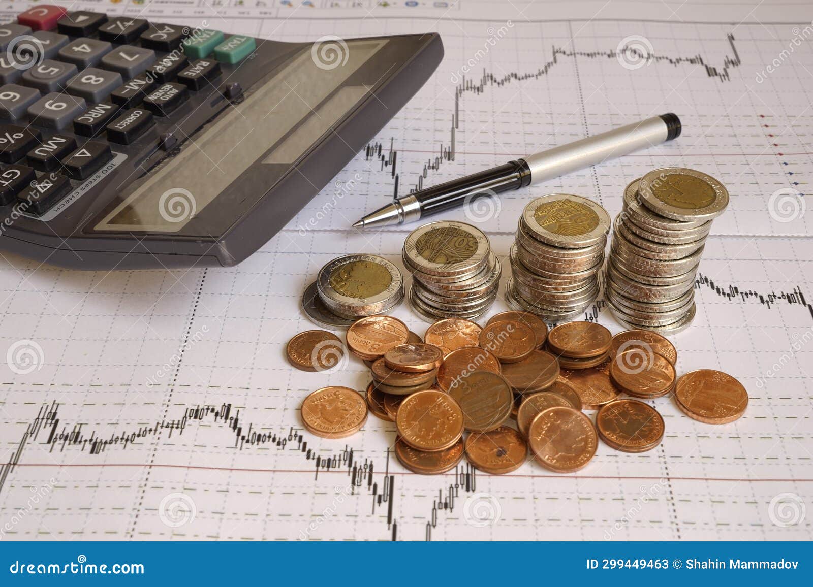 Old Dusty Ball Pen on Calculator with Stack Coins Stock Image - Image ...