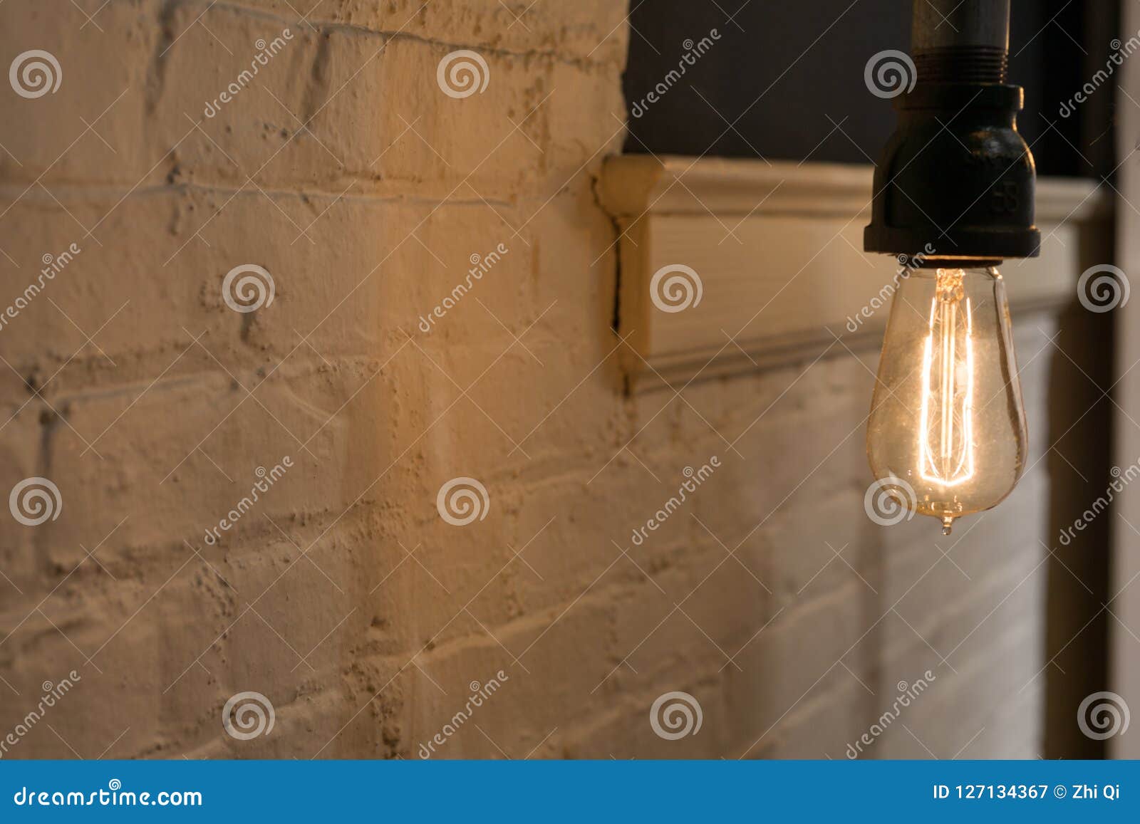 Old Dusty Light Bulb Glowing in the Dark Stock Image - Image of ...