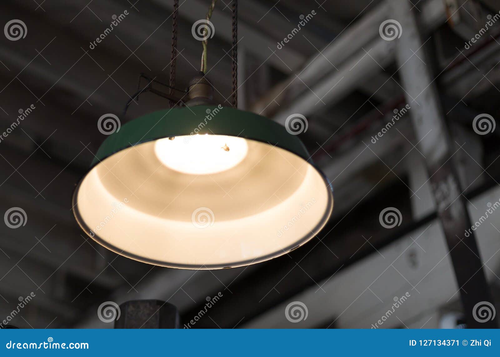 Old Dusty Light Bulb Glowing in the Dark Stock Image - Image of ...