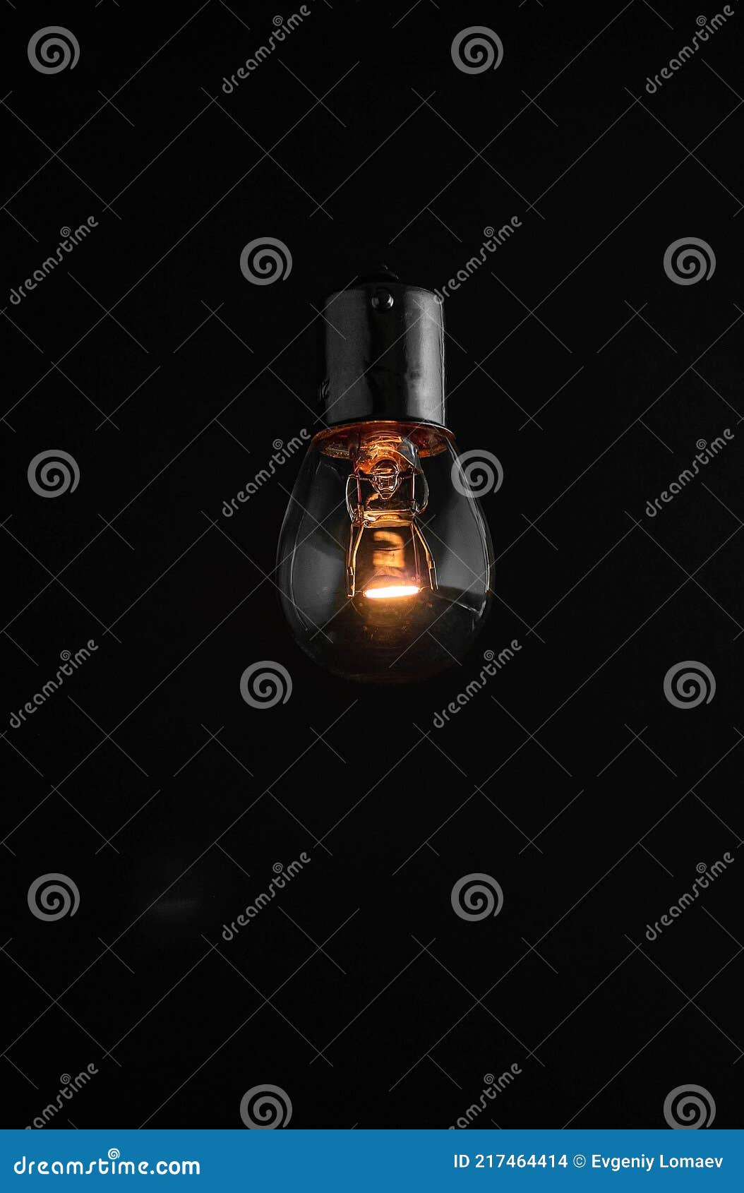 Old Dusty Light Bulb Glowing in the Dark Stock Photo - Image of power ...