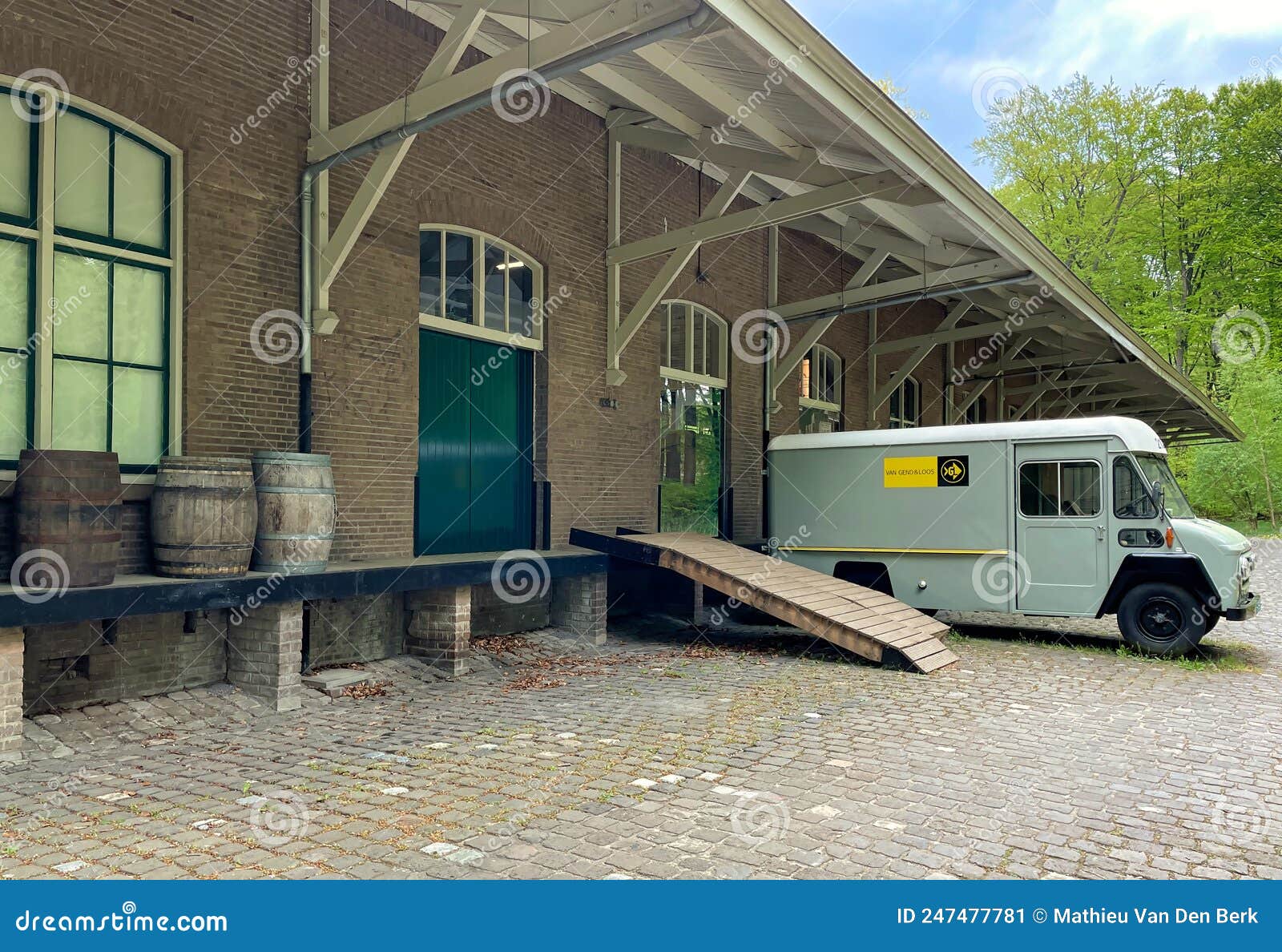 Old Dutch Transport Company with Bus and Loading Dock Stock Image ...