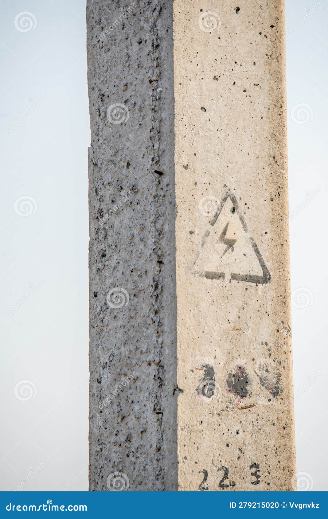 An Old Electric Shock Warning Sign on a Concrete Pillar Stock Photo ...