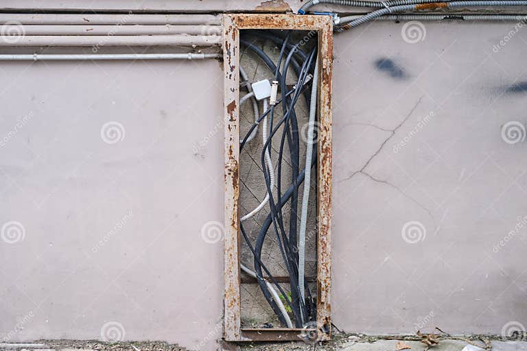 Old Electrical Wiring on the Front of the Building Stock Photo - Image ...