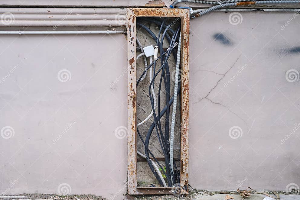 Old Electrical Wiring on the Front of the Building Stock Photo - Image ...