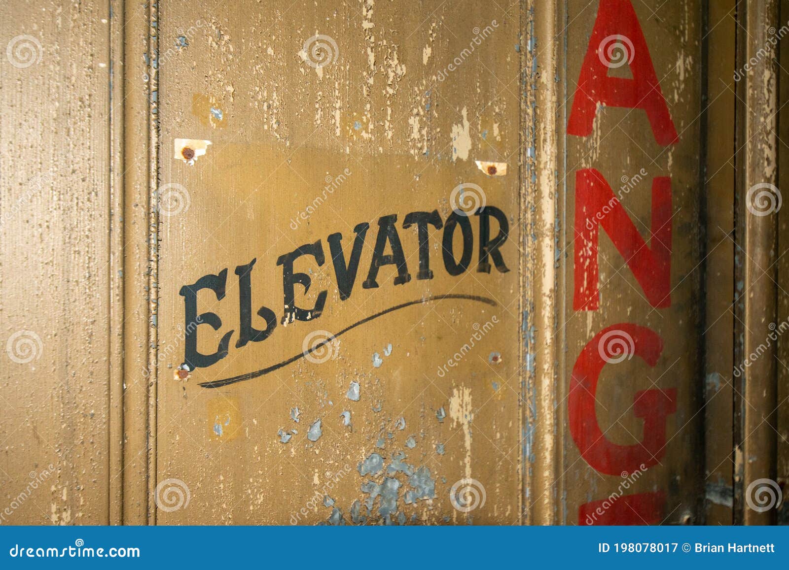 An Old Elevator Door with Old Fashioned Text that Says Elevator Stock ...