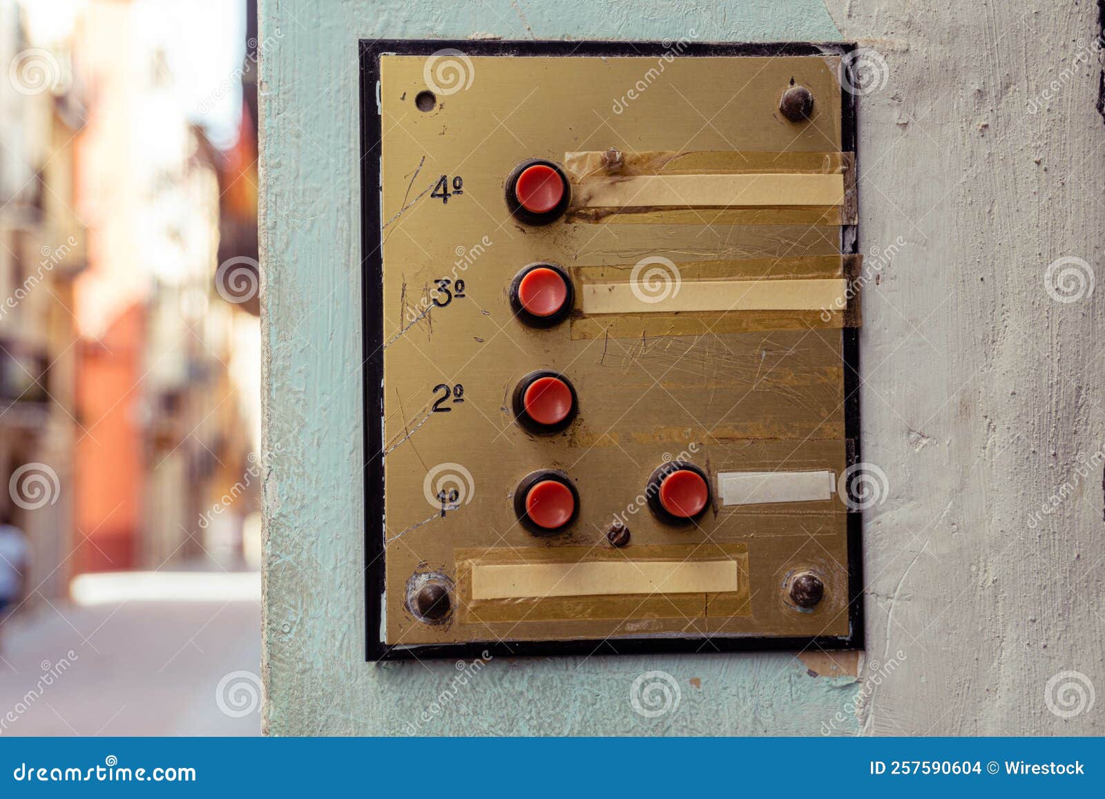 Old Elevator Panel with Red Buttons Attached To a Wall Outdoors in ...