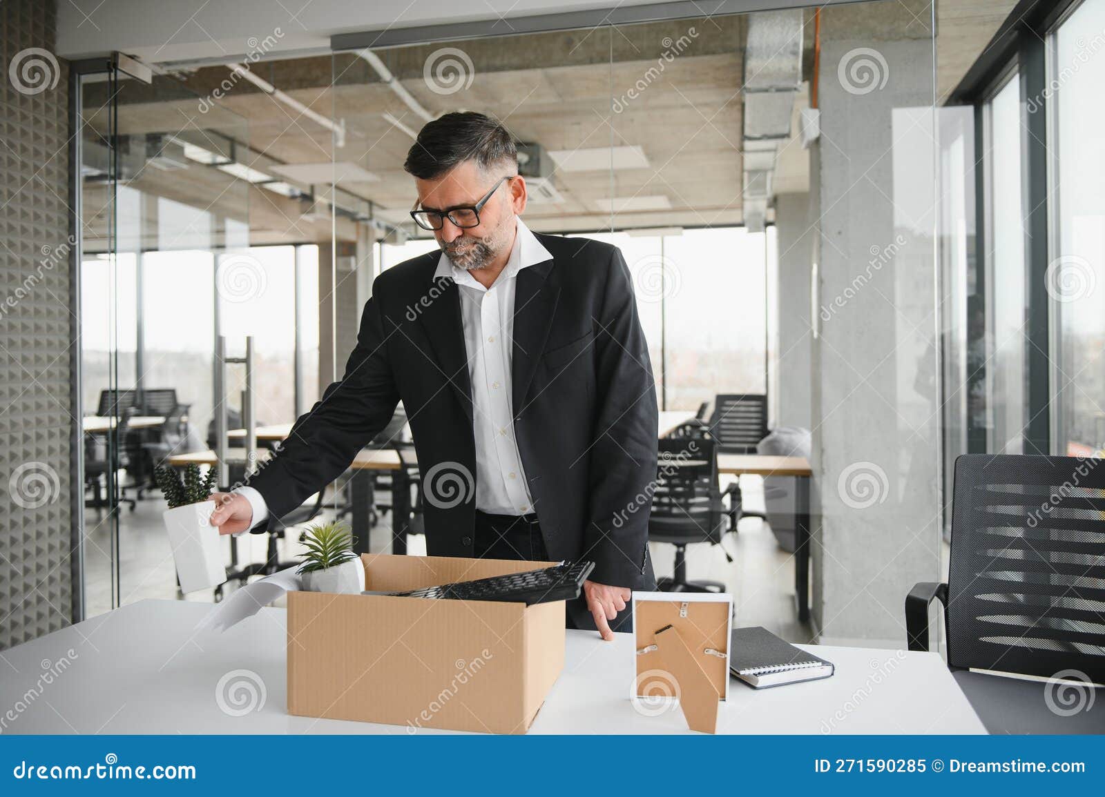Old Employee Leaving Office with the Box Full of Belongings Stock Image ...