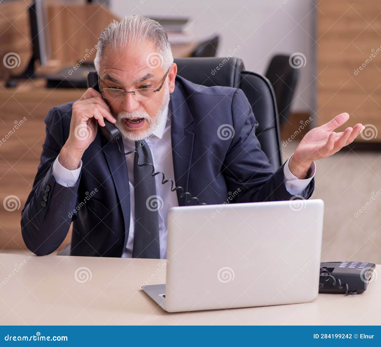 Old Male Employee Unhappy with Excessive Work in the Office Stock Photo ...