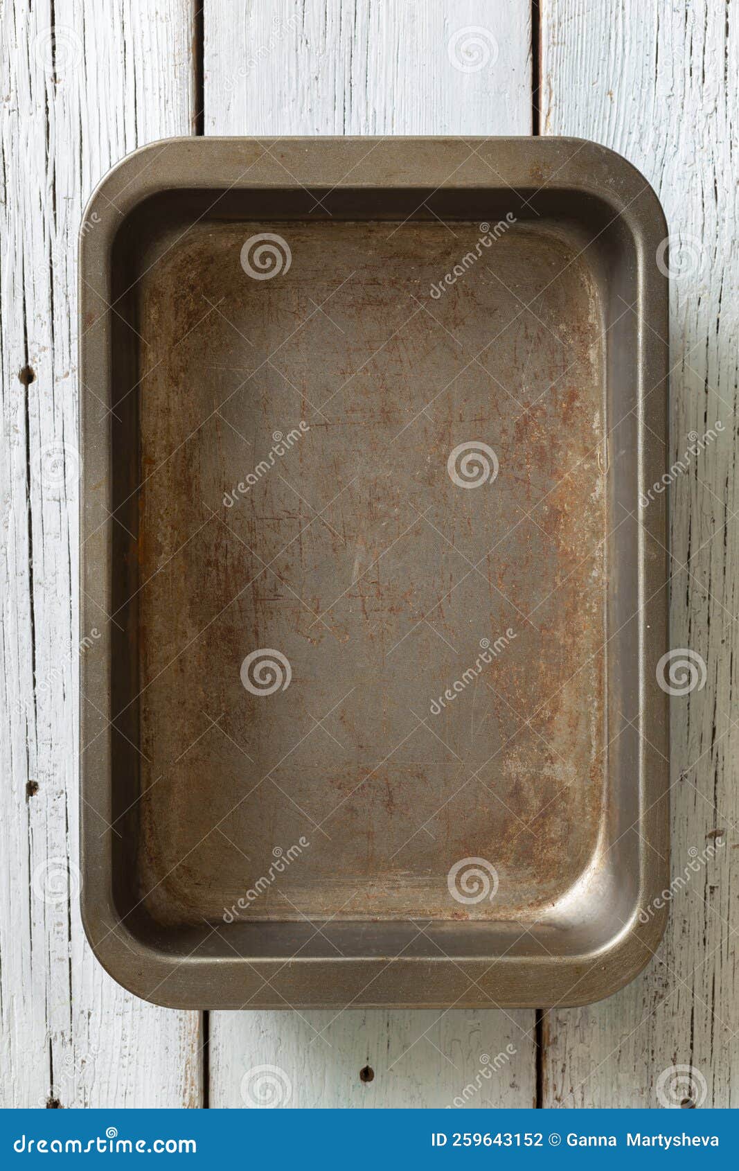 Old Empty Iron Baking Tray on Light Wooden Table, Stock Photo - Image ...
