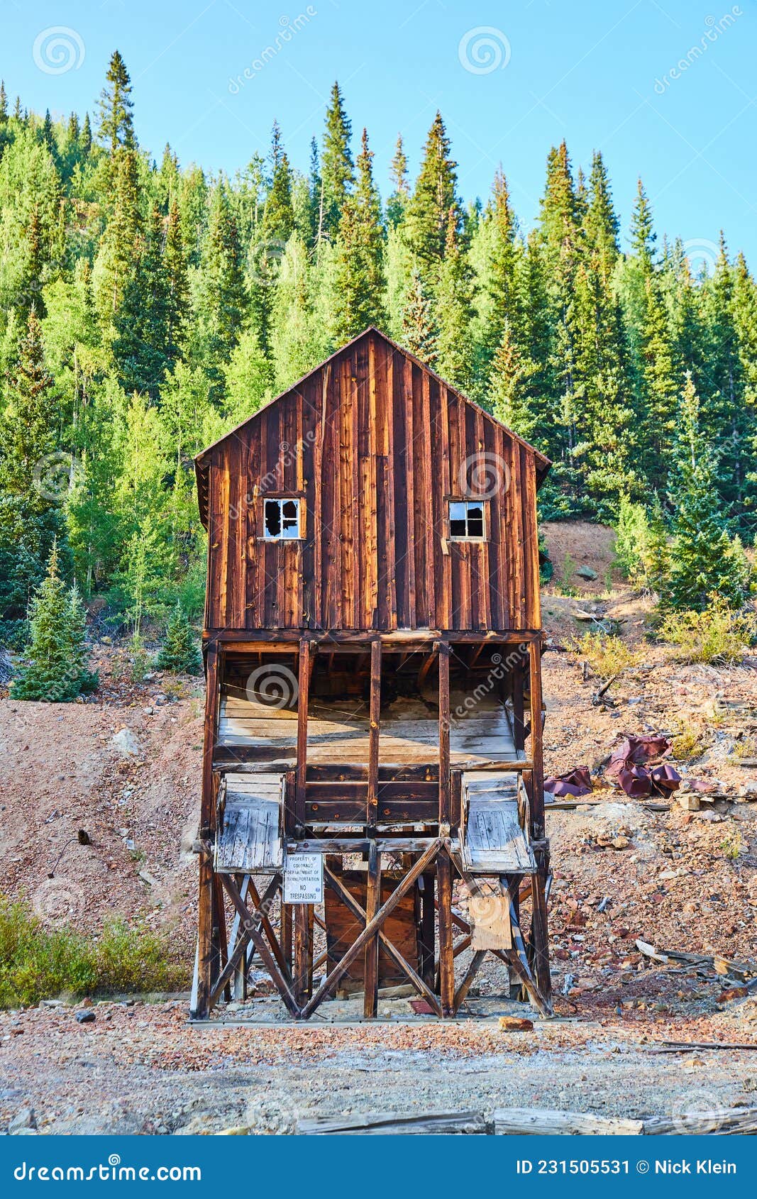 Mining Structure At End Of Road With Large Vertical Mountains In ...