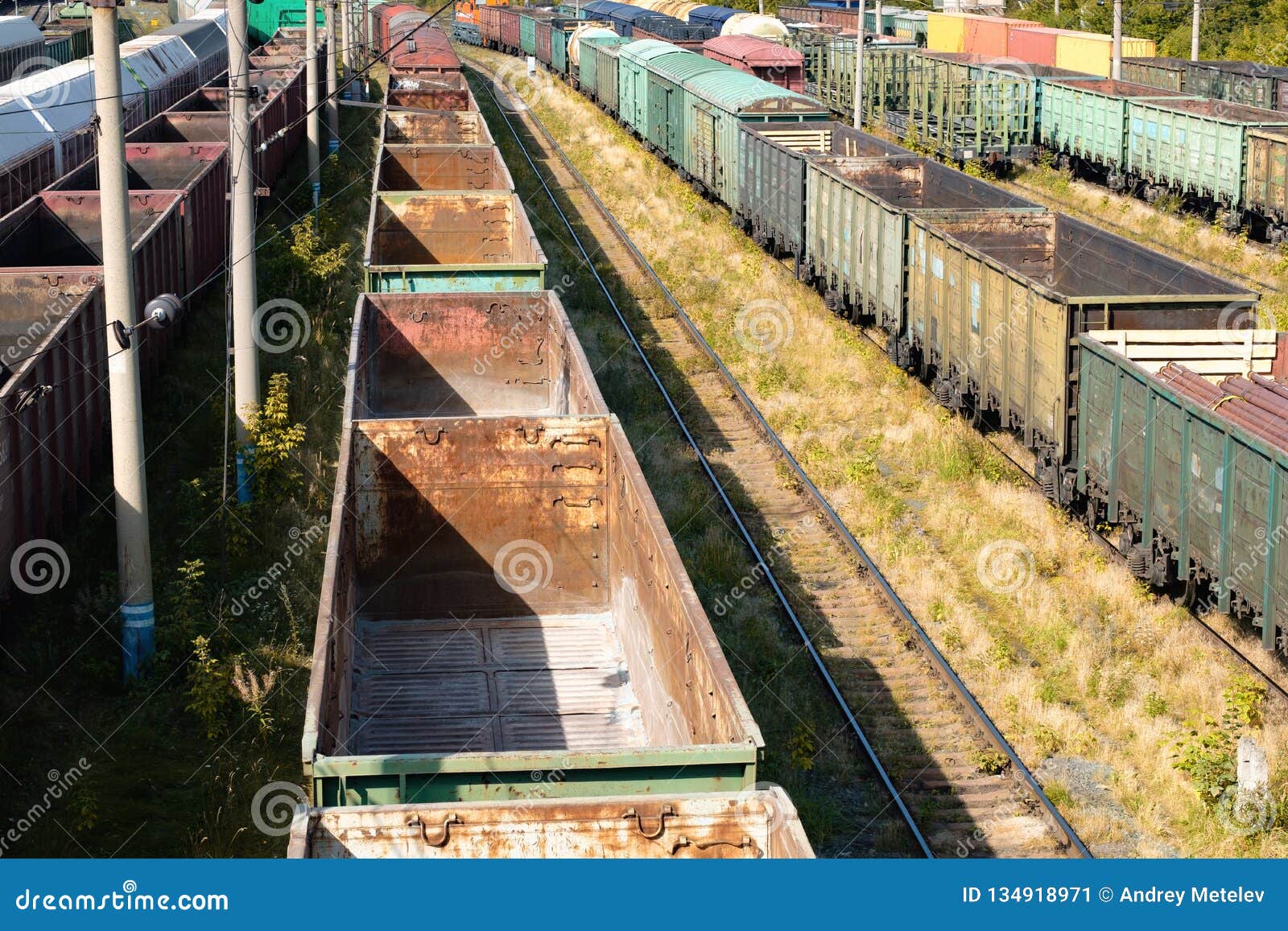 An Old Empty Rusty Train Cars, Rails and Cars Stock Image - Image of ...