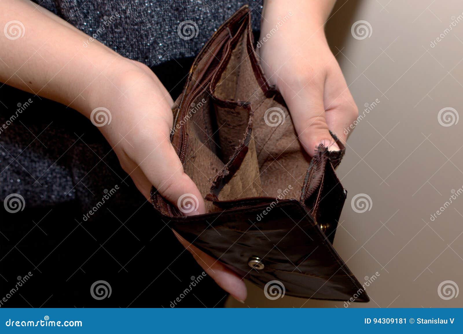 Old Empty Wallet in the Hands of Women. Poverty Concept. Stock Image ...