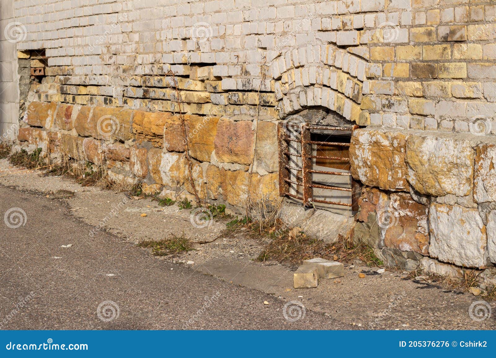 Old Eroding Brick Wall Texture Background With Red Bricks Stock Photo ...