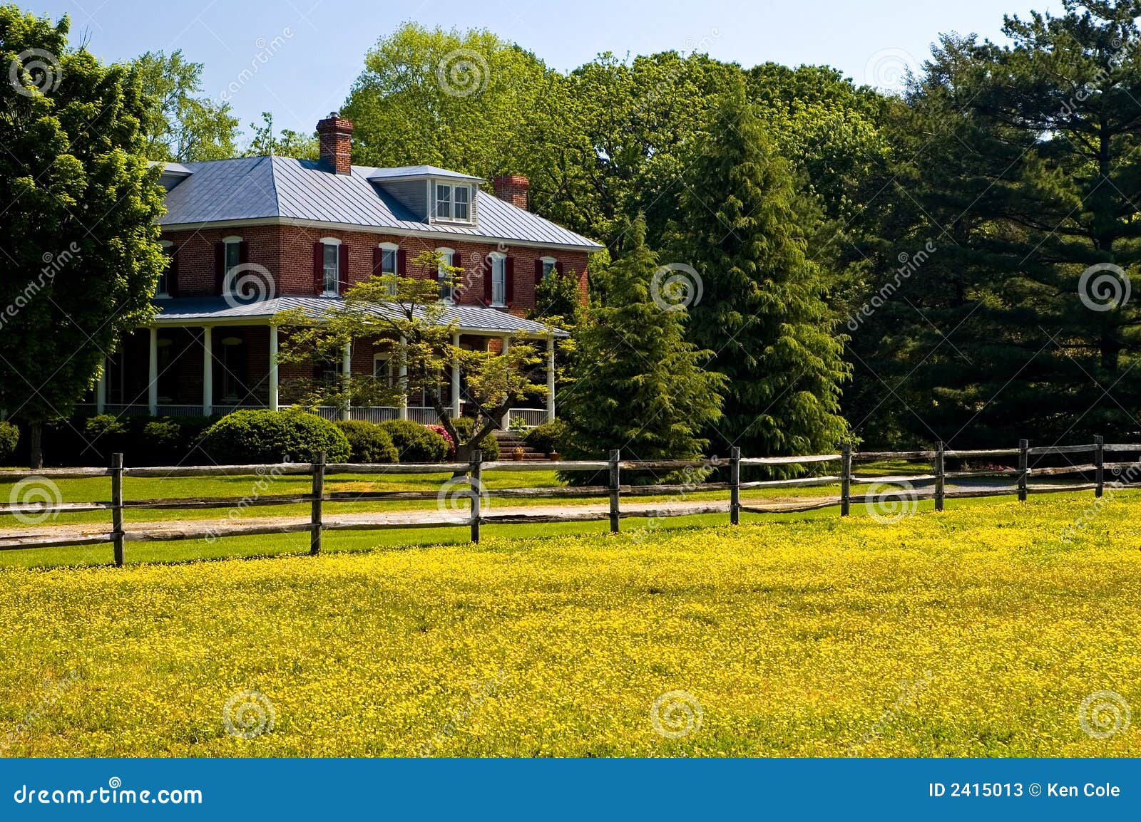 Old estate home in spring stock image. Image of yellow - 2415013