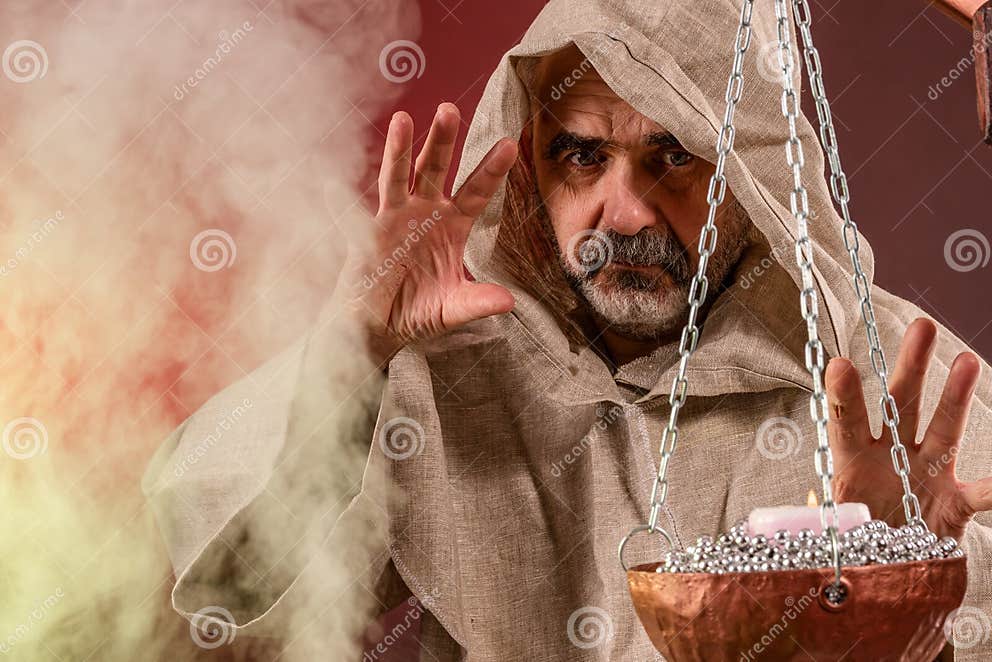 Old Evil Magician Casts Magic Spells Stock Image - Image of burn, hands ...