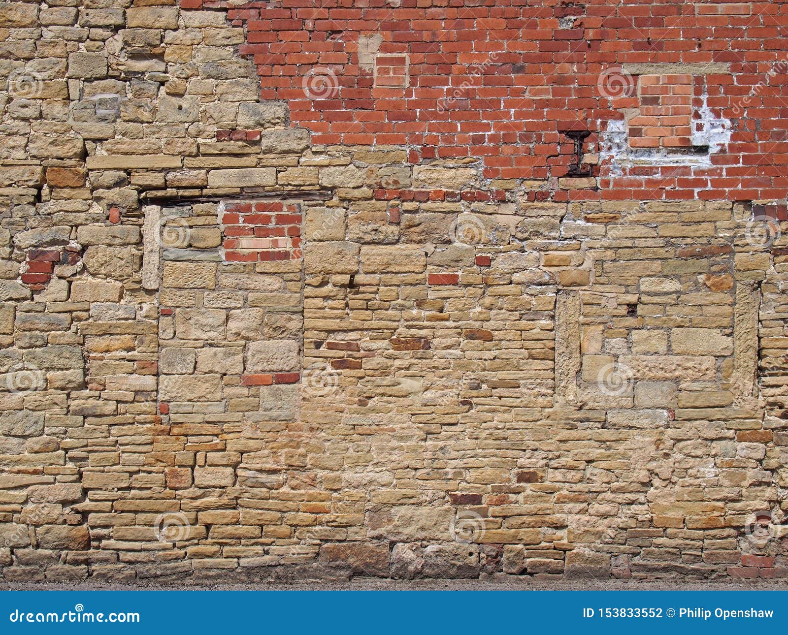 Old Exterior Wall with an Irregular Patched and Repaired Brick and ...