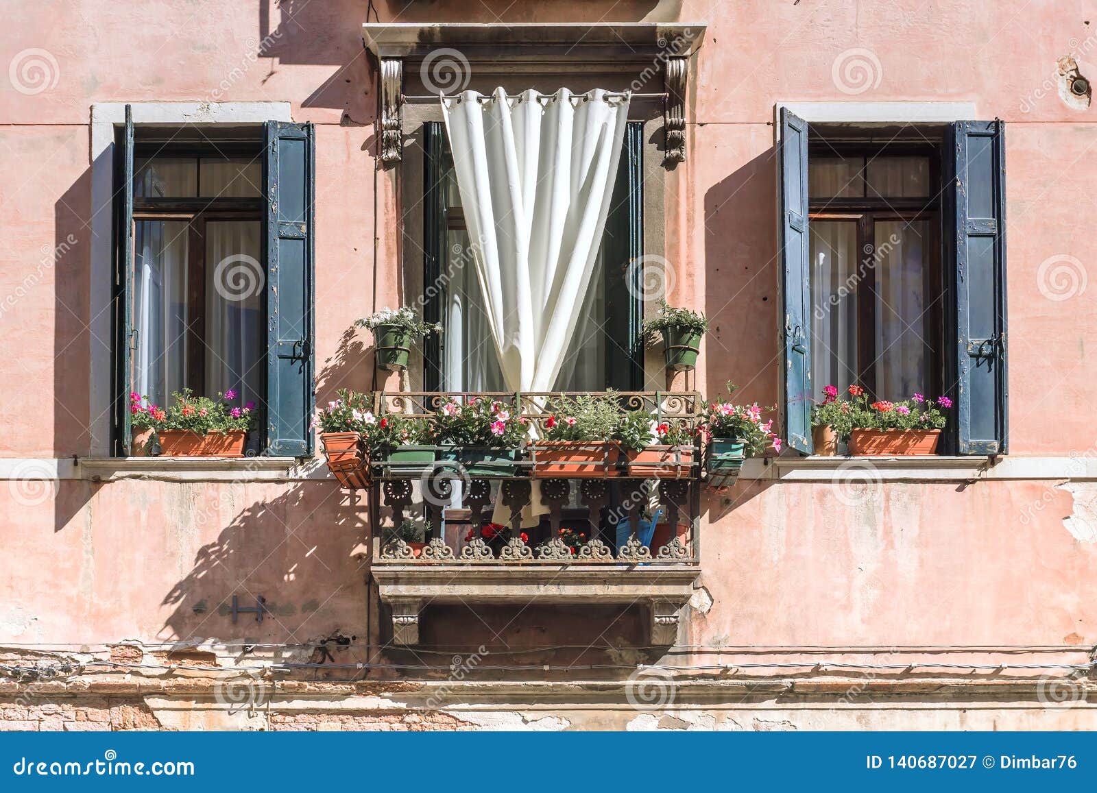 Old Facade.windows and Balcony Decorated with Flowers Stock Image ...
