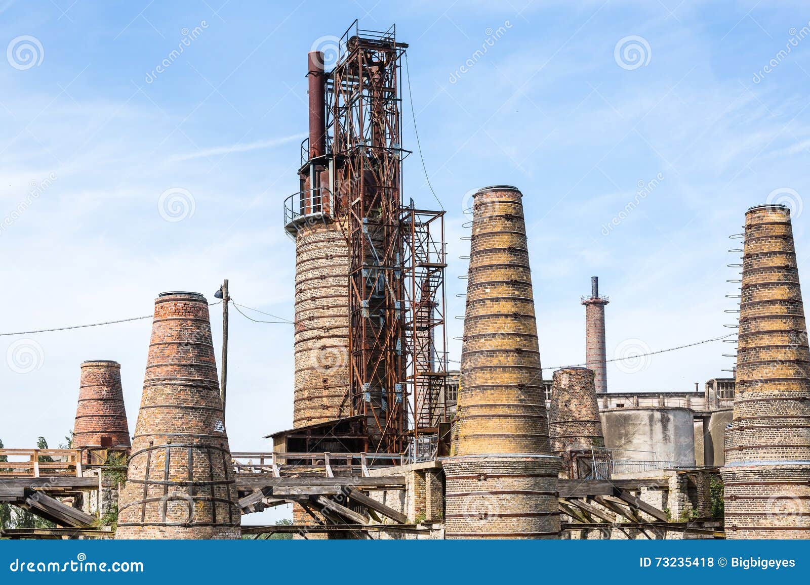 Old factory with chimneys stock photo. Image of chimney - 73235418