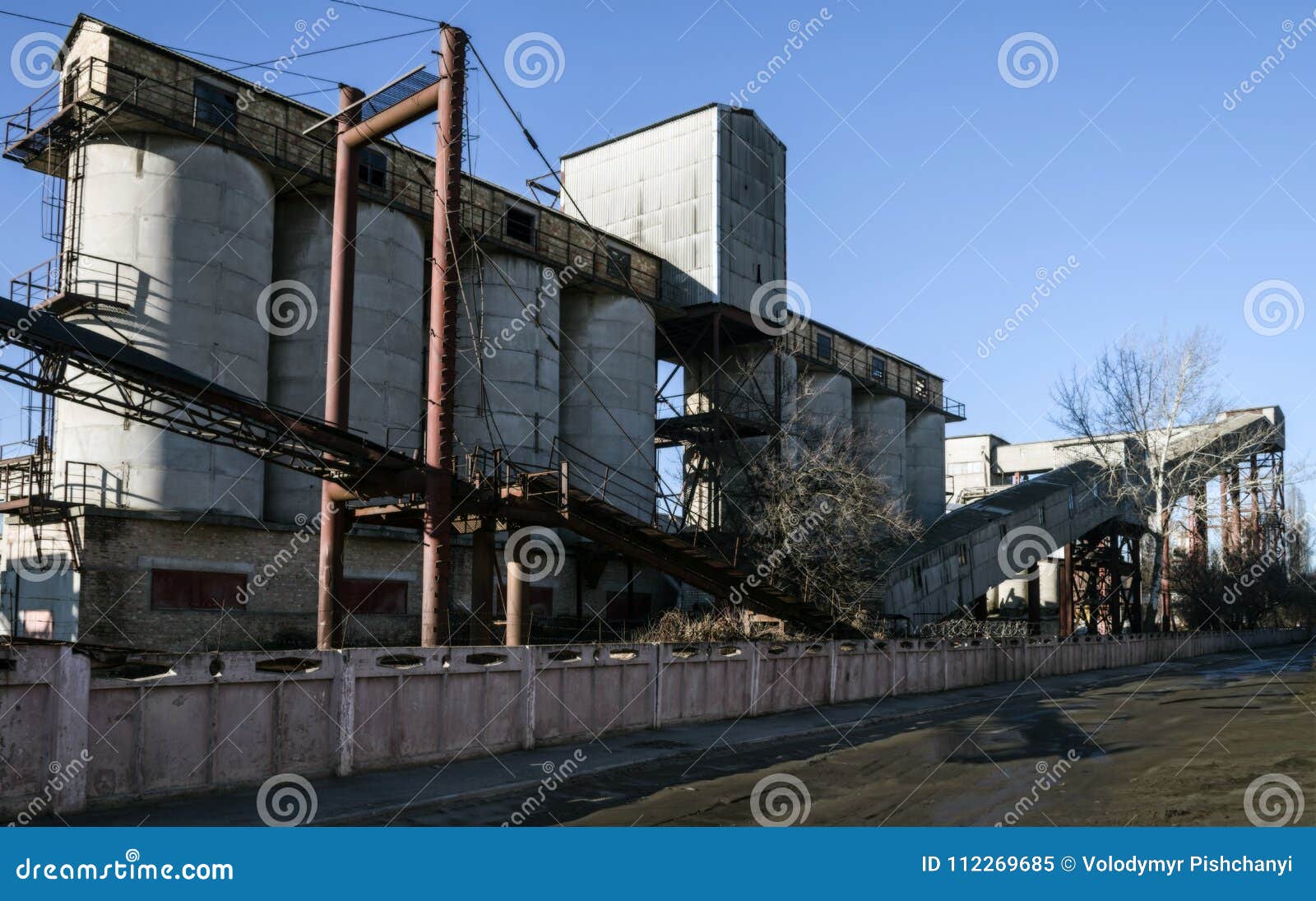 Old Factory Construction on the Background of Sky. Stock Image - Image ...