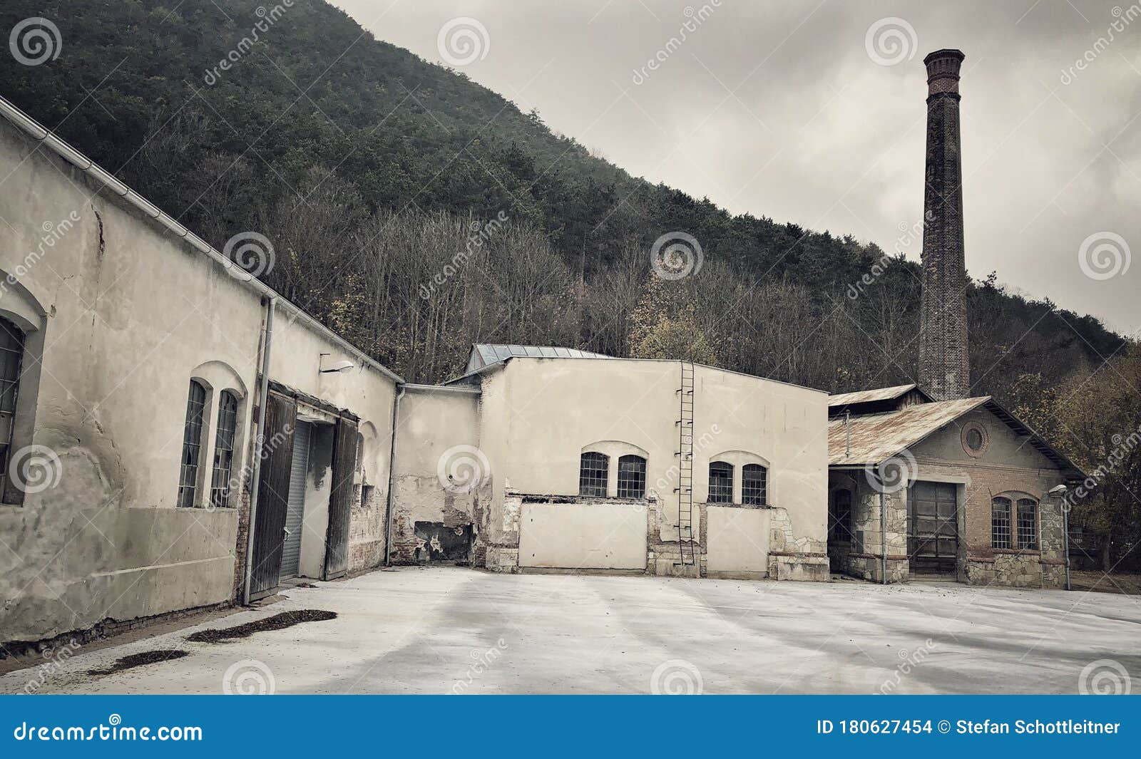 An Old Factory from Outside Stock Photo - Image of roof, mountain ...