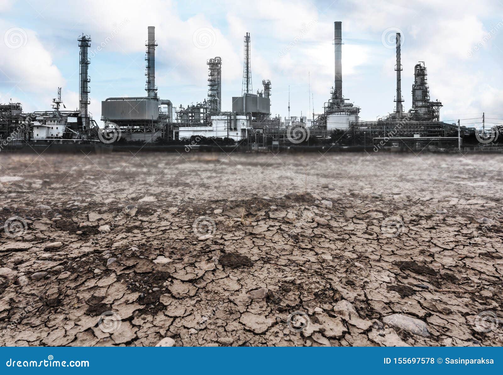 Old Factory Over Dry Cracked Ground. Pollution and Environmental ...