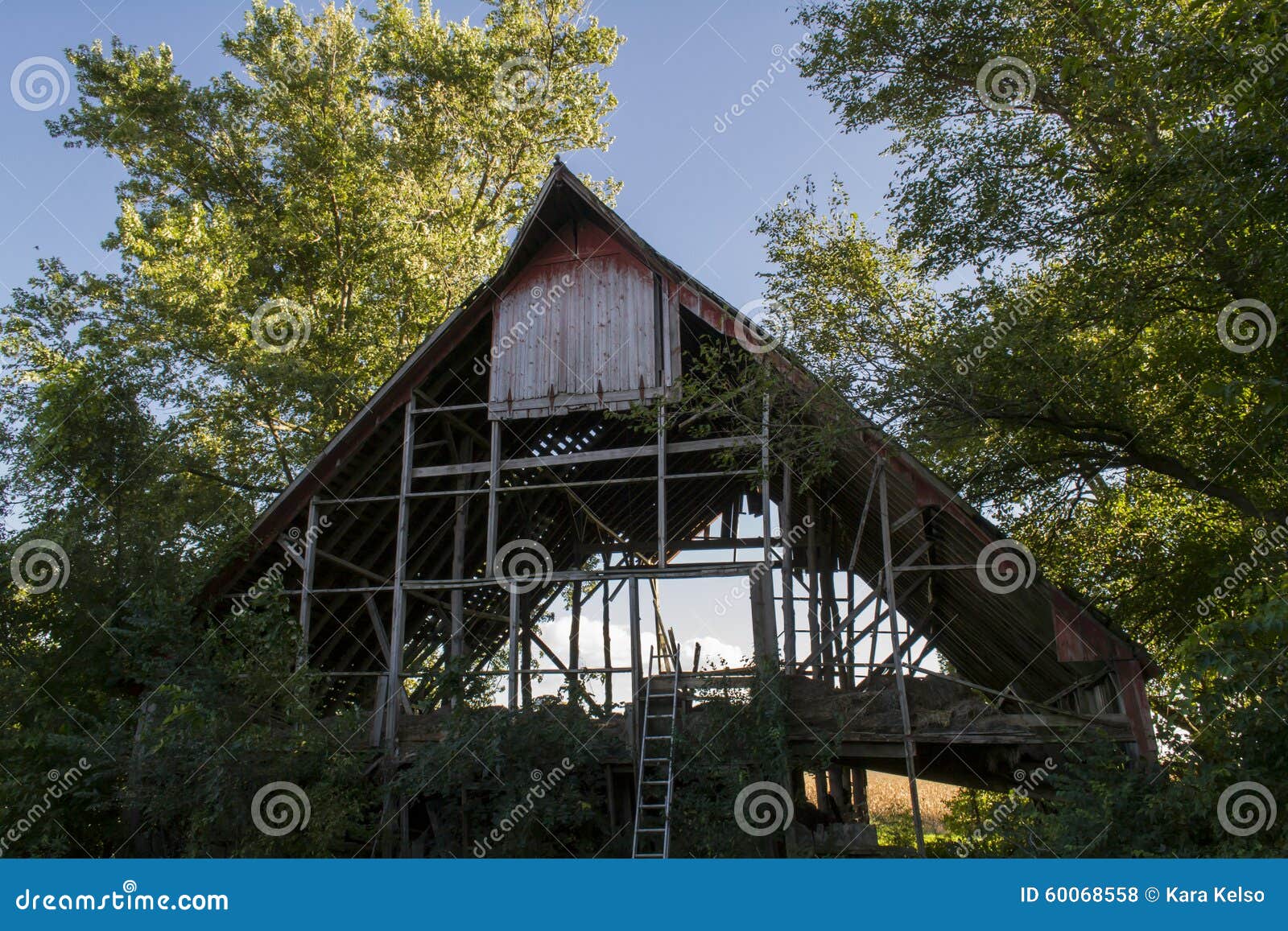 Old Falling Down Barn stock photo. Image of blue, clouds - 60068558