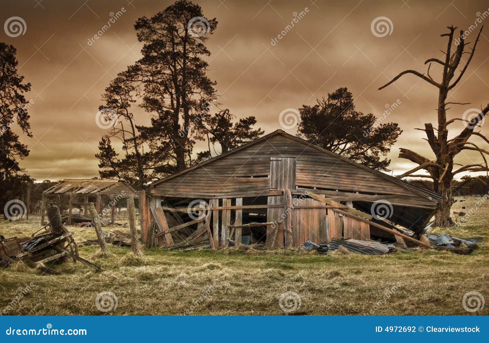 An Old Farm Building And Surrounding Trees Destroyed By A Tornado ...