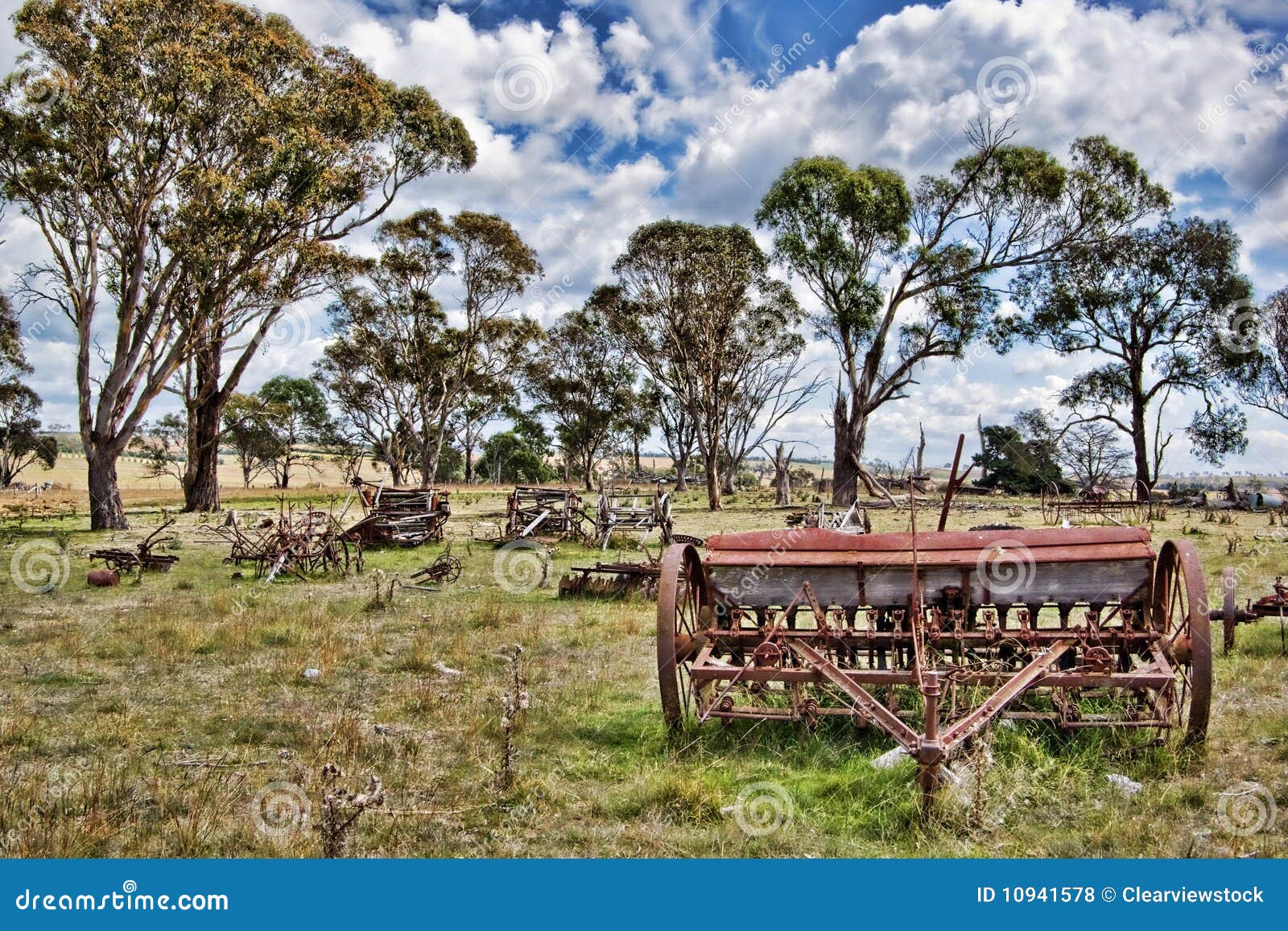 Old Farm Machinery in Field Stock Photo - Image of corroded, rusty ...