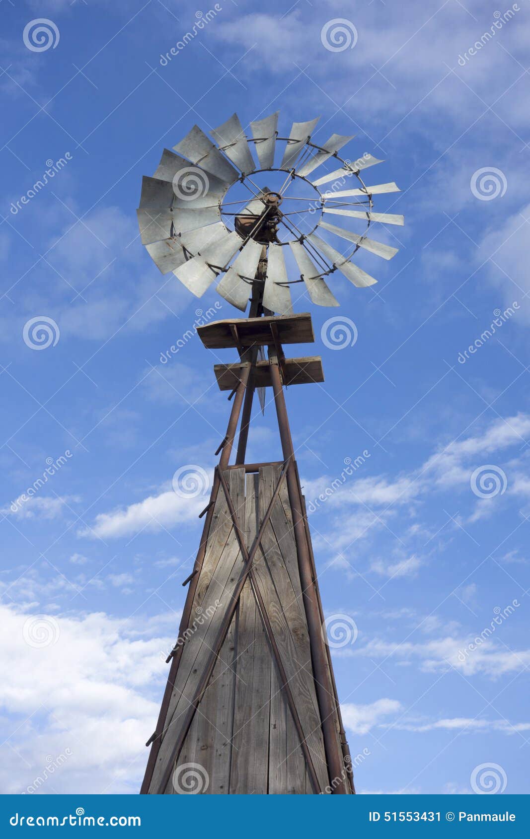 Old farm windmill stock image. Image of sunny, farm, spins - 51553431