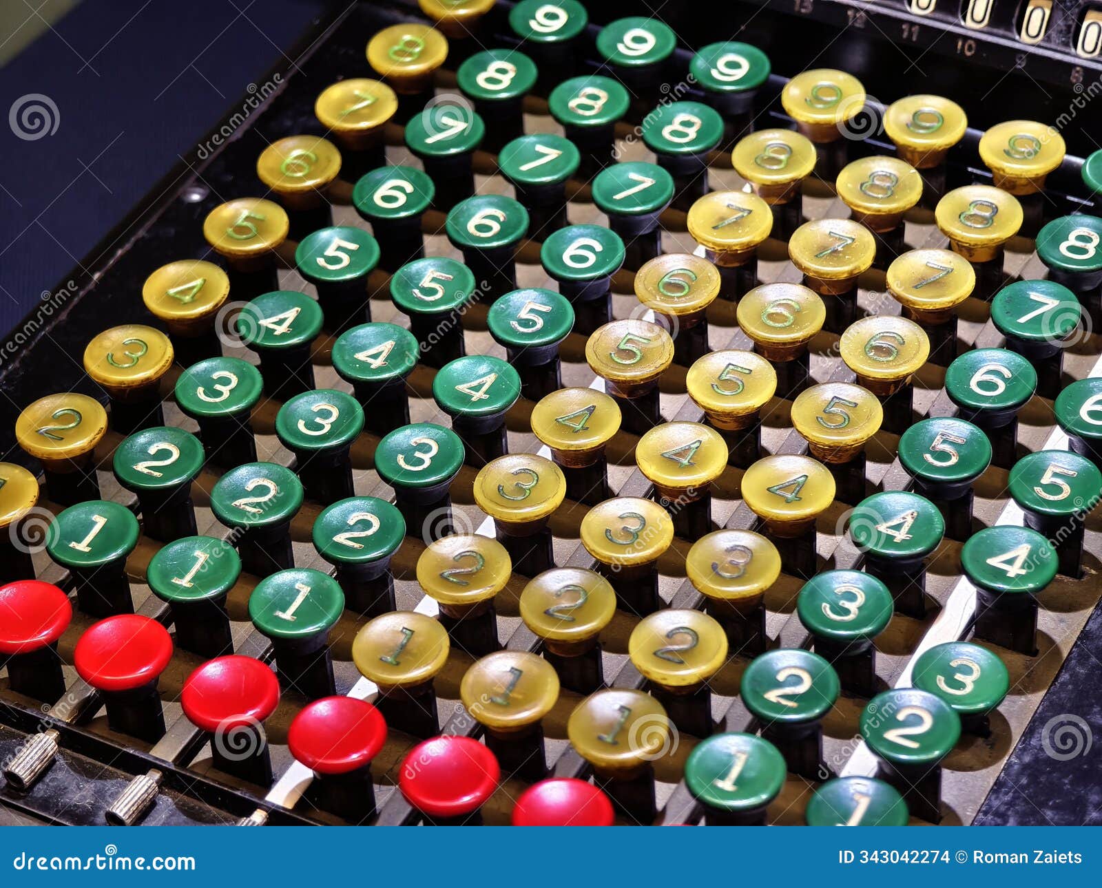 An Old Fashioned Adding Machine Features a Drawer Located Underneath it ...
