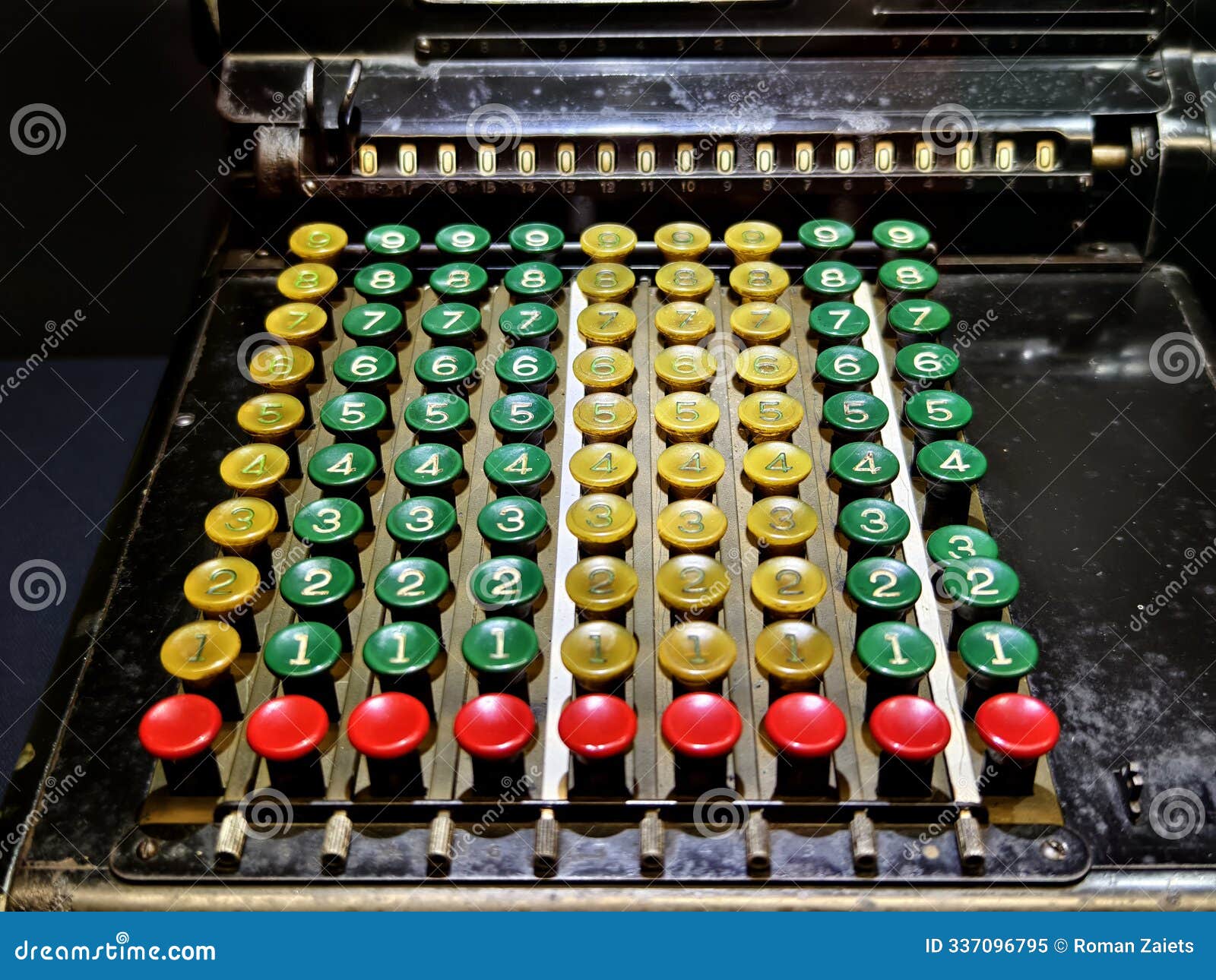 An Old Fashioned Adding Machine Features a Drawer Located Underneath it ...