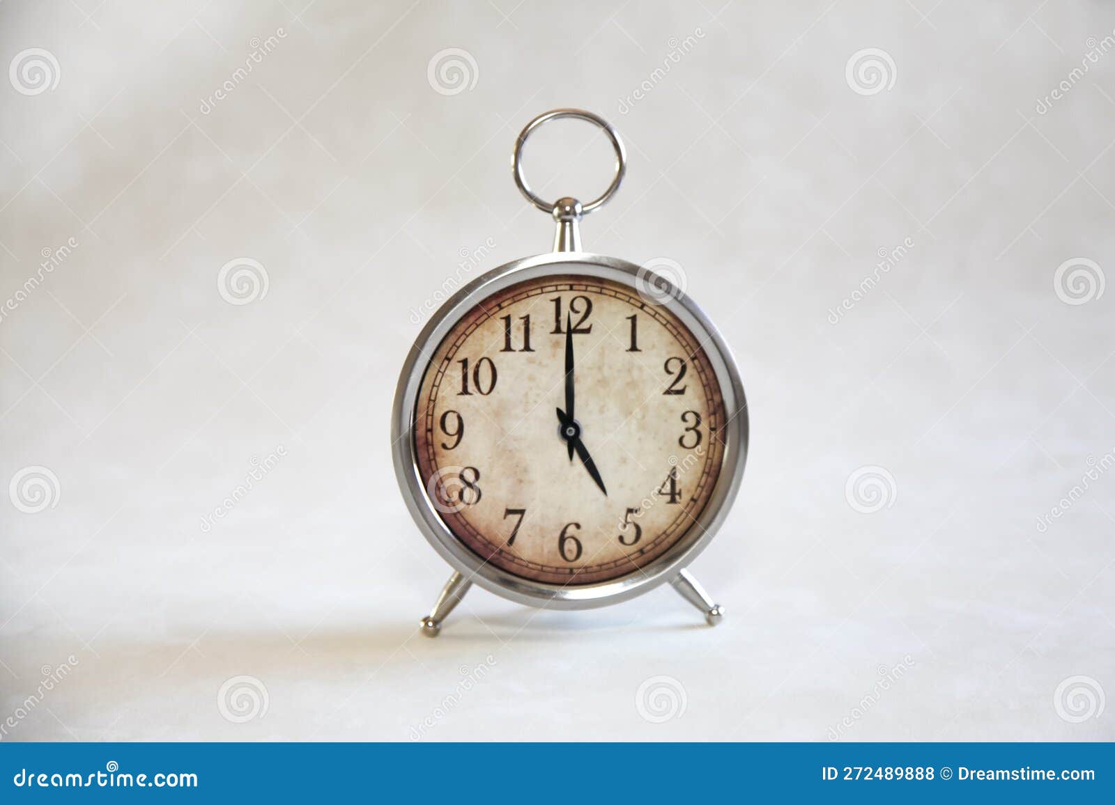 Alarm Clock at 5 o clock. stock photo. Image of clock - 272489888