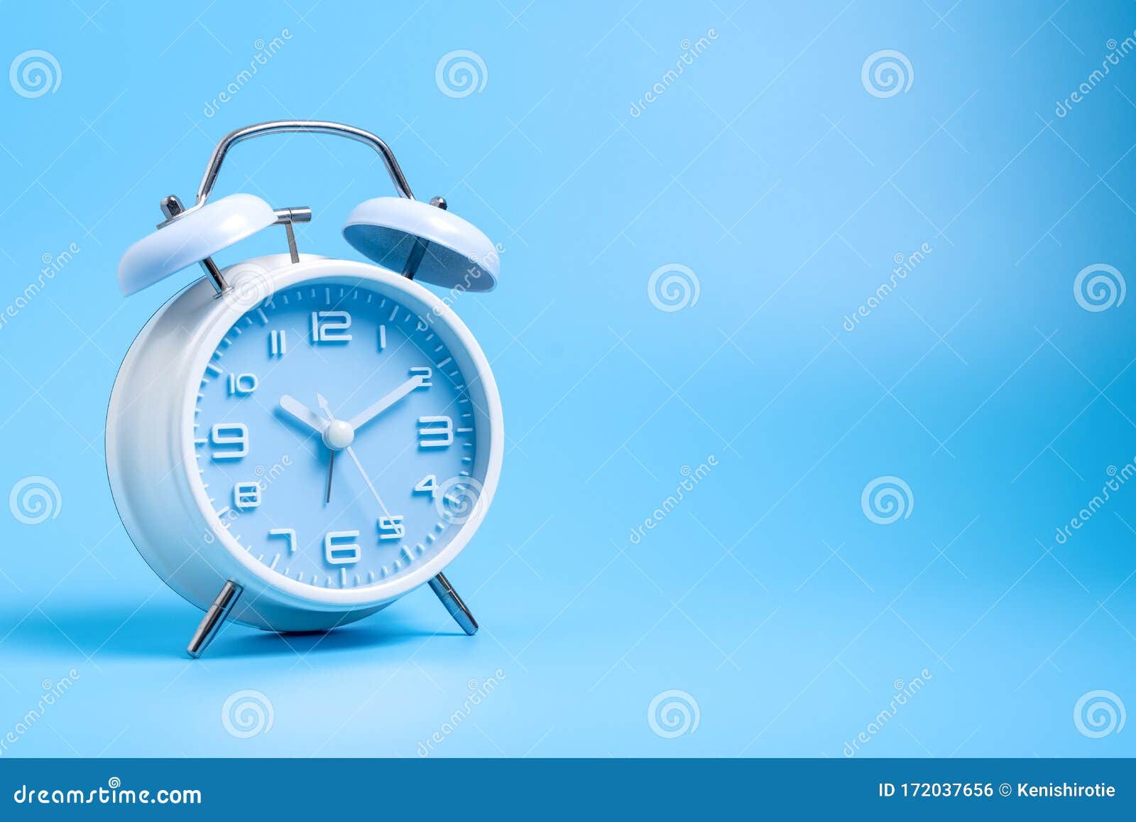 Old Fashioned Alarm Clock on Blue Background Stock Photo - Image of ...
