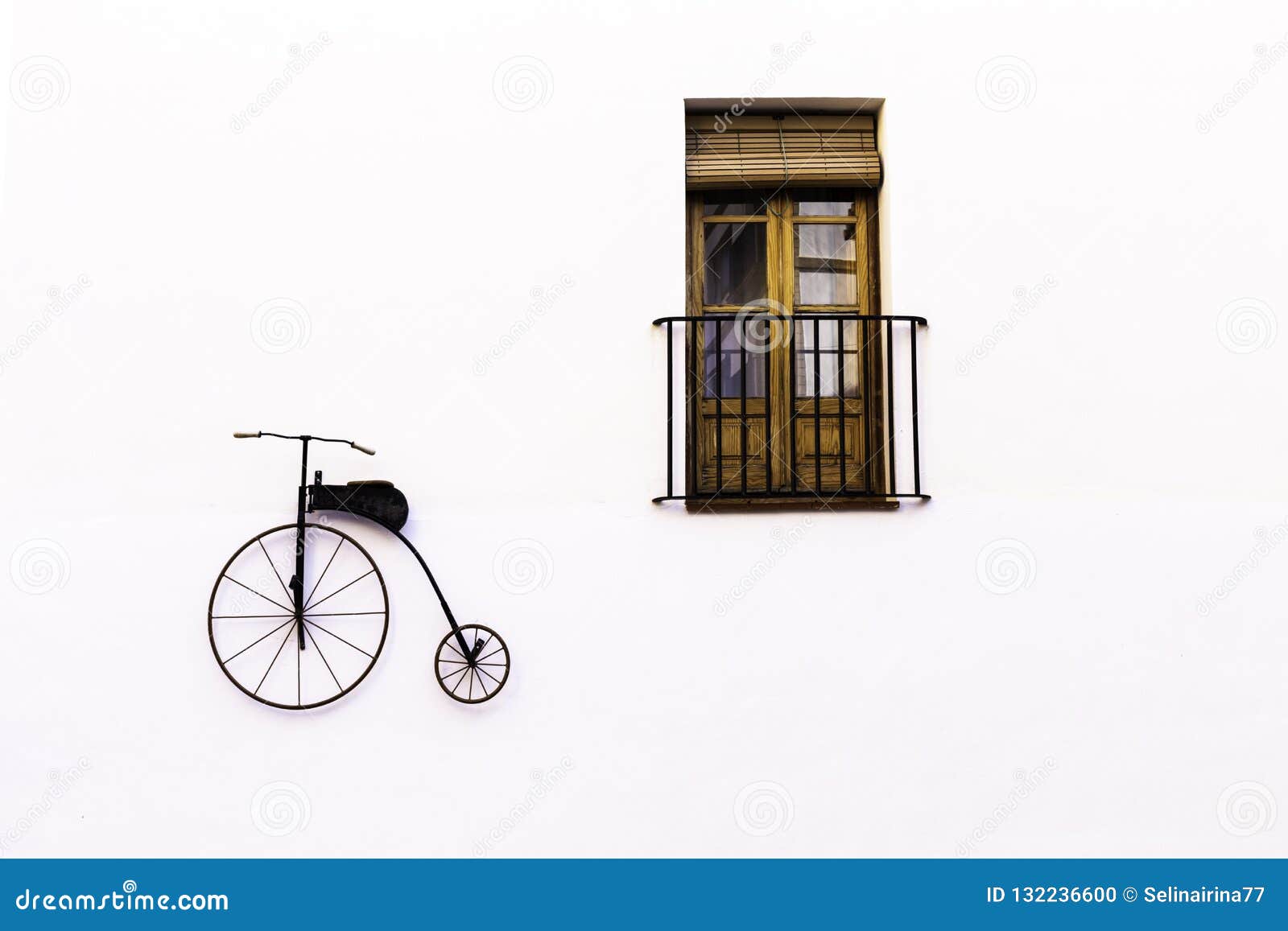 Old-fashioned Bike and Window with Balcony As Decor on a White Wall ...