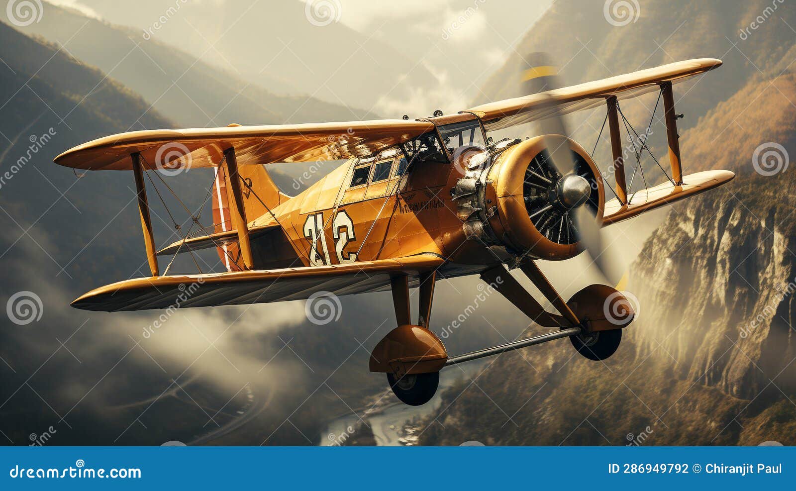An Old Fashioned Biplane Performing a Stunt Mid Air Stock Photo - Image ...
