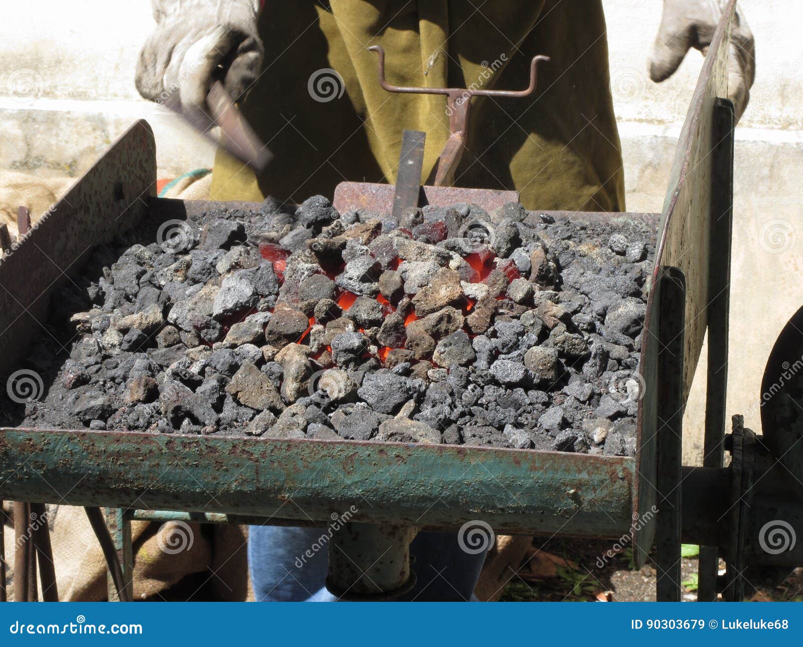 Old-fashioned Blacksmith Furnace with Burning Coals for Iron Work Stock ...