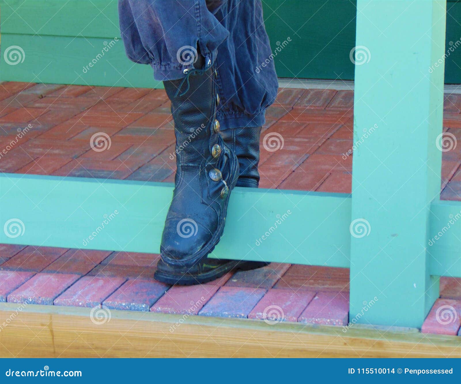Old Fashioned Boot on Bright Railing Stock Photo - Image of bricks ...