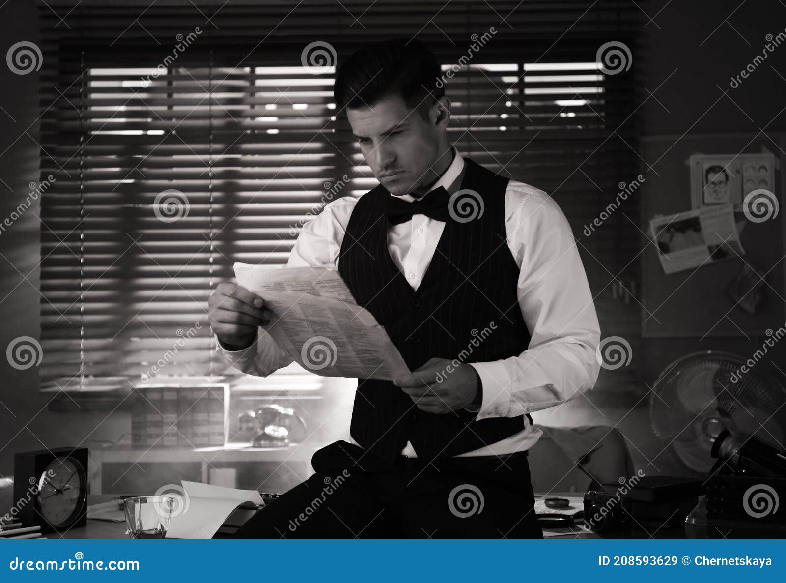 Old Fashioned Detective with Documents in Office. Black and White ...