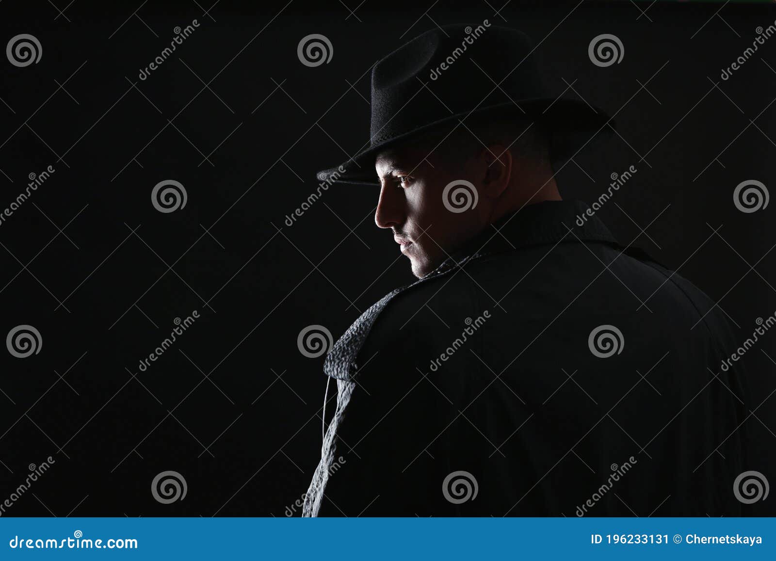 Old Fashioned Detective In Hat On Dark Background. Space For Text ...