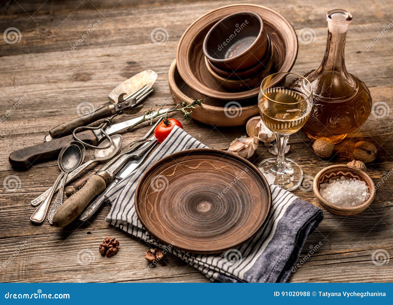 Old-fashioned Dishware that Looks Rustic on Table Stock Photo - Image ...