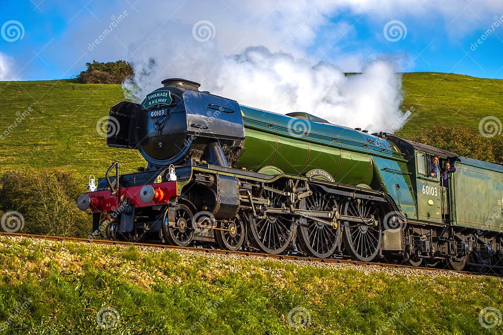 Old-fashioned Flying Scotsman Train Steaming on the Railway Editorial ...