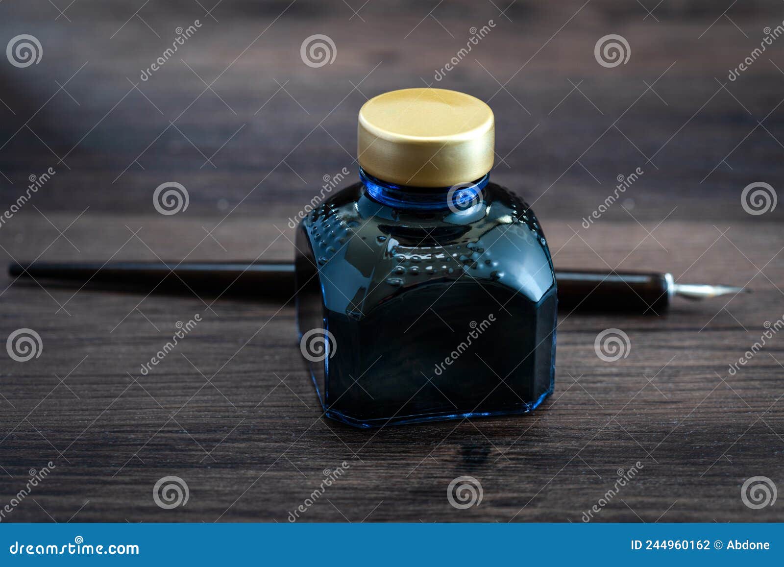 Ink bottle and nib pen stock photo. Image of texture - 244960162