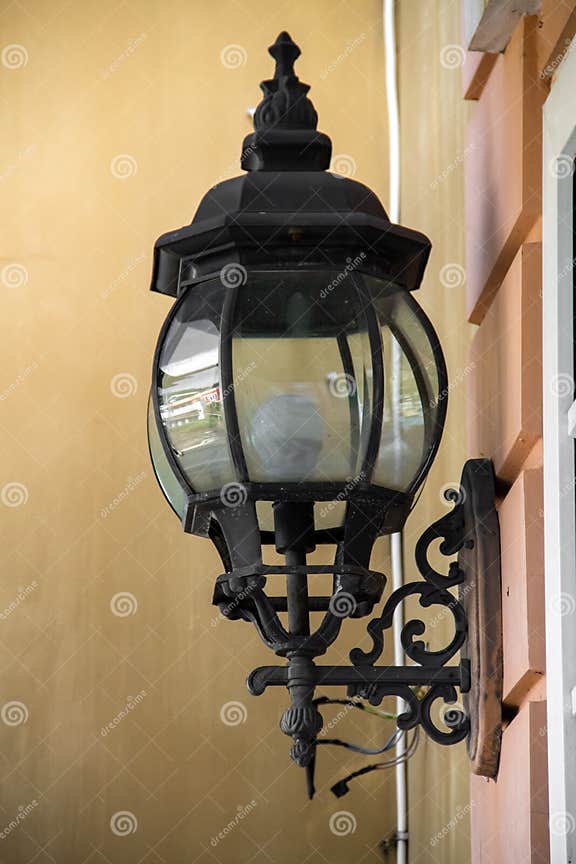 Old Fashioned Lamp Hanging on the Wall Stock Photo - Image of light ...